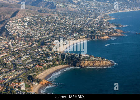 A coastal view of Laguna Beach California with vibrant red Aloe Vera ...