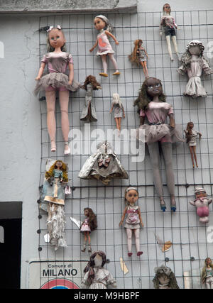 Italy, Milan, wall doll Stock Photo - Alamy
