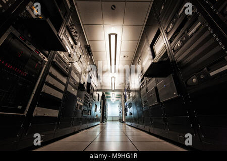 Storage racks aligned in a computer server room Stock Photo - Alamy