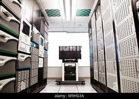 Storage racks aligned in a computer server room Stock Photo - Alamy