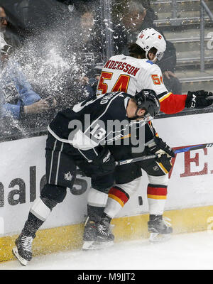 Calgary Flames defenseman Rasmus Andersson (4) and Buffalo Sabres right wing Alex Tuch (89) race ...