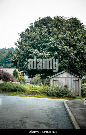 Old garages in a rundown back street Stock Photo - Alamy