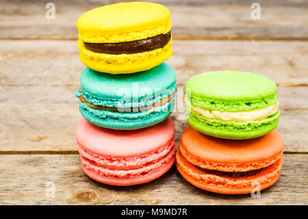 macaroon pastry set on a wooden table Stock Photo - Alamy