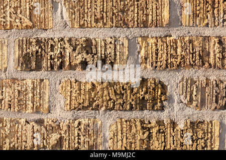 Vertical score rough bricks Stock Photo - Alamy