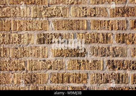 Vertical score rough bricks Stock Photo - Alamy