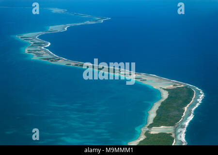 Coral reef with clouds, reef fringes in the sea, Tikehau Atoll, Pacific ...