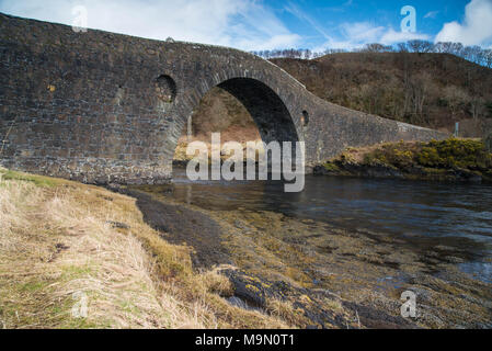 Historic stone Clachan Bridge (Atlantic Bridge) connecting the Isle of ...