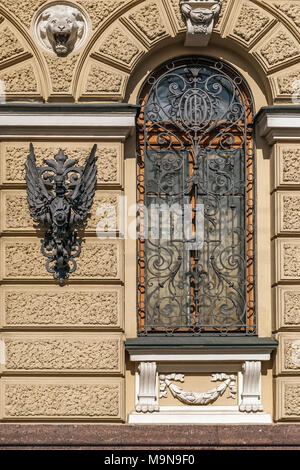 White stucco house with bars on windows Stock Photo - Alamy