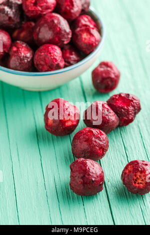Fresh Cherries on an old wooden table as detailed close-up shot ...