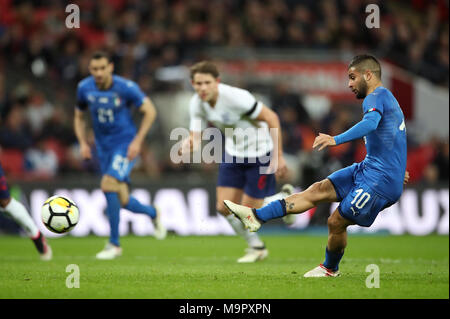 Italy’s Lorenzo Insigne scores his side's first goal of the game from ...