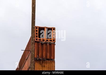 Detail of load-bearing reinforced concrete blocks wall under ...