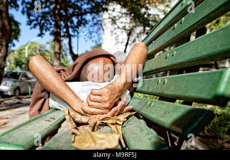 Rio de Janeiro, Brazil. Homeless street child crouching in the Stock ...