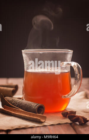 indian tea masala white cap spices on wooden background Stock Photo - Alamy