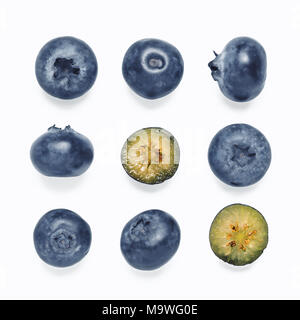 Top view of whole blueberries and cut strawberries on sackcloth Stock ...