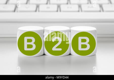 Letter dice in front of a keyboard - September 03 Stock Photo - Alamy