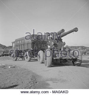 A British Army AEC Matador Artillery Tractor being driven around on ...