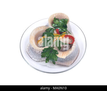 Matjes herring fillets in oil with parsley on clear plate isolated on ...