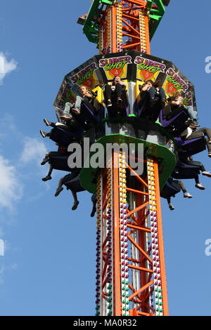 Riders on the Super Shot drop tower amusement ride. Canfield Fair ...
