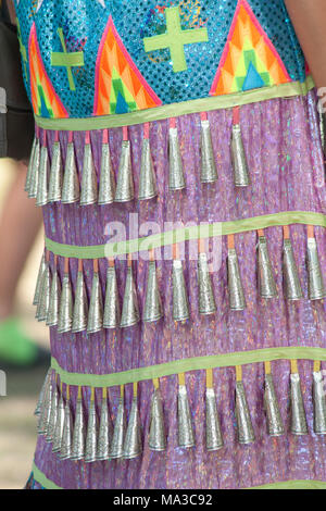 Detail of jingle dance dress costume and moccasins worn by indigenous ...