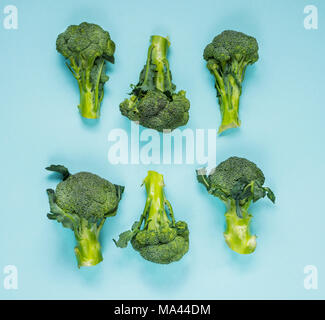 top view of slice of brocoli on green background Stock Photo - Alamy