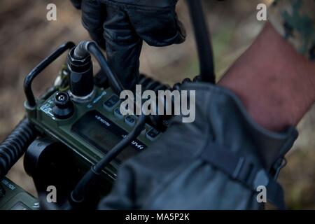 U.S. Marine Corps radio operators use communication gear during a Stock ...