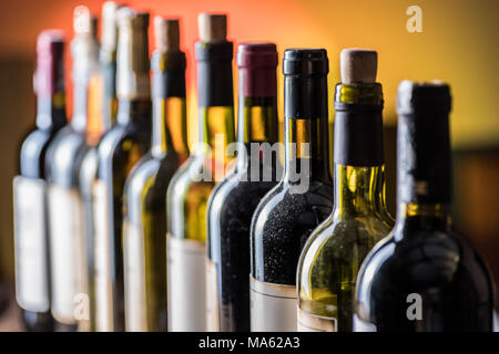 Line of wine bottles. Close-up Stock Photo - Alamy