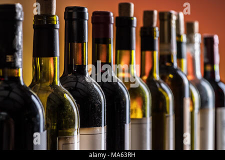 Line of wine bottles. Close-up Stock Photo - Alamy