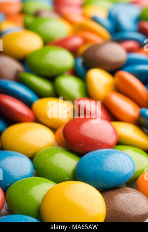 Colourful smarties on white background Stock Photo - Alamy