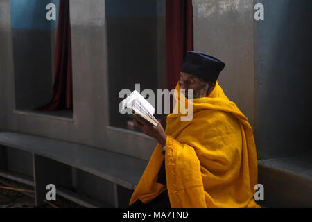 Ethiopian Orthodox monk praying inside the Coptic Chapel of St. Michael ...