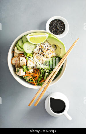Poke bowl with silken tofu, seaweed, rice and vegetables Stock Photo ...