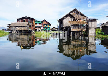 Wooden houses on piles inhabited by the Inthar minority, Inle Lake ...