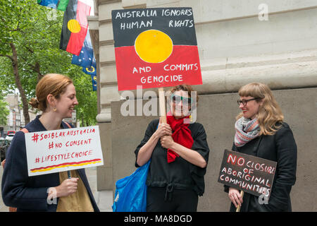 aboriginal flag red earth yellow sun black people Stock Photo - Alamy