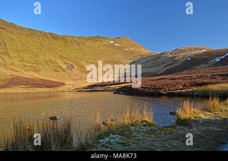 Llyn Lluncaws in Cadair Berwyn Mountains at Pistyll Rhaeadr Stock Photo ...