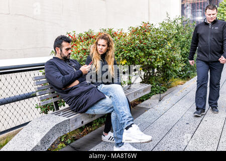 Chelsea City Street with people walking on sidewalk and traffic on the ...