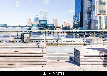The new High Line Park wooden seating architecture with people family ...