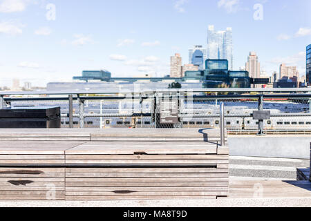 The new High Line Park wooden seating architecture with people family ...