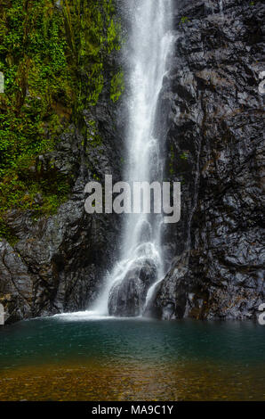 Beautiful, refreshing view of water falling from height, splashing over ...