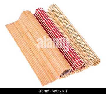 Bamboo mats of different colors on white background. Studio Photo Stock ...