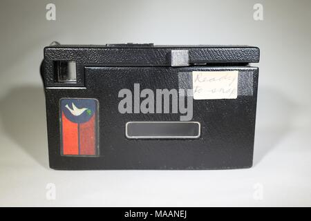 A 1970's kodak instamatic 126 film camera photographed against a white ...