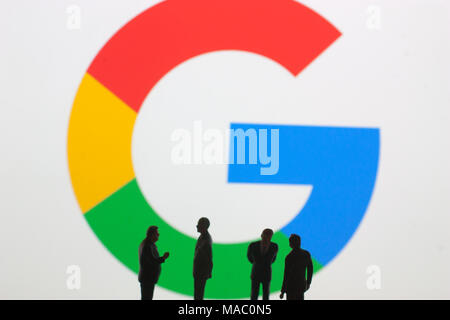 Google logo with models of people in foreground Stock Photo - Alamy