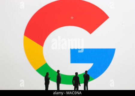 Google logo with models of people in foreground Stock Photo - Alamy