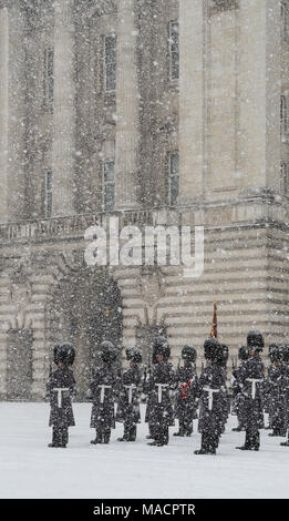 Changing of the Guard takes place outside Buckingham Palace during a ...