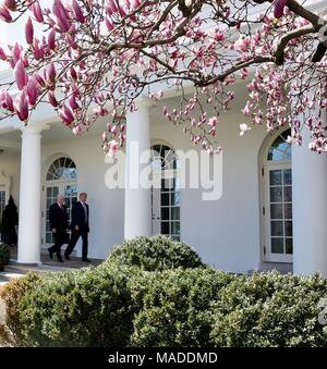 President Donald Trump, right, walks with Col. Kevin Eley, 89th ...