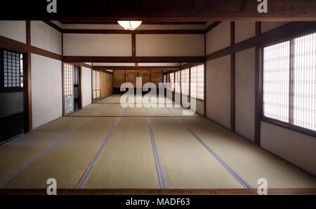 Traditional Japanese room interior with painted sliding doors and ...