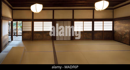 Traditional Japanese room interior with painted sliding doors and ...