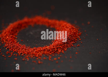 Aleppo Pepper mild chilli flakes in small bowl Stock Photo - Alamy