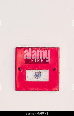 Red box of fire alarm on wall Stock Photo - Alamy