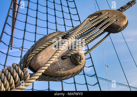 Ropes, pulley, shroud - parts of an old ship, sailboat. Black and white ...