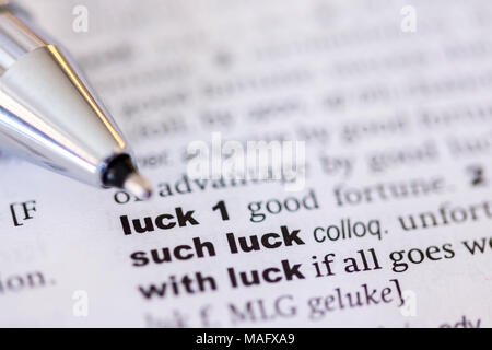 Definition of word lucky in dictionary Stock Photo - Alamy