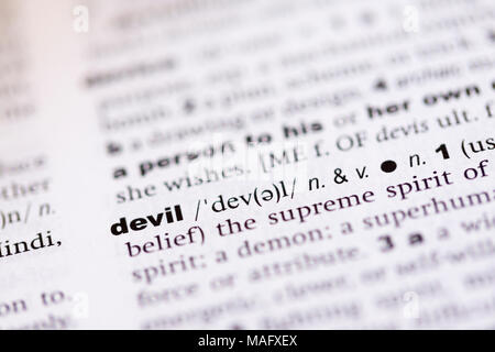 Dictionary word devil Stock Photo - Alamy